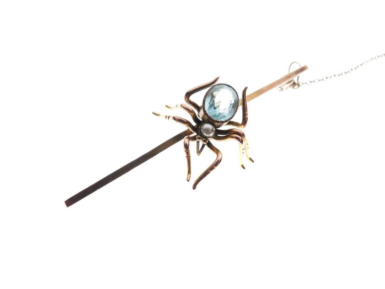 Lot 144 - Gem-set spider bar brooch