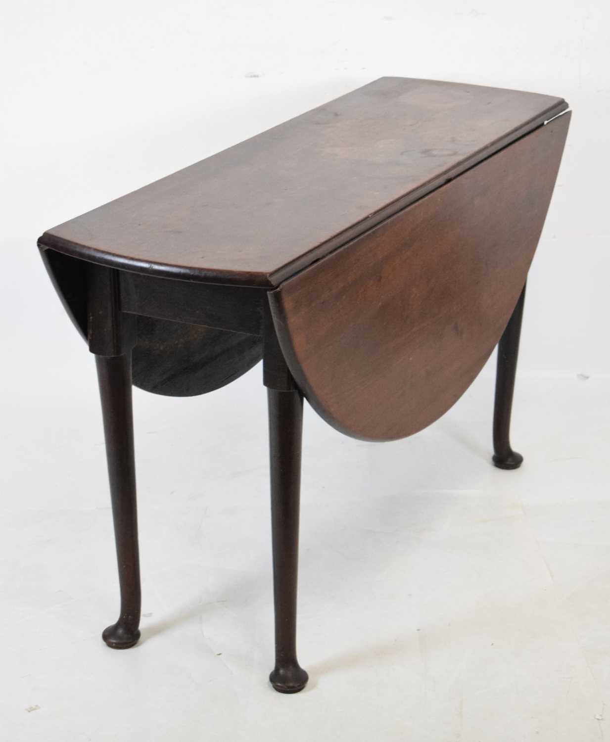 Lot 513 - Mahogany drop leaf dining table