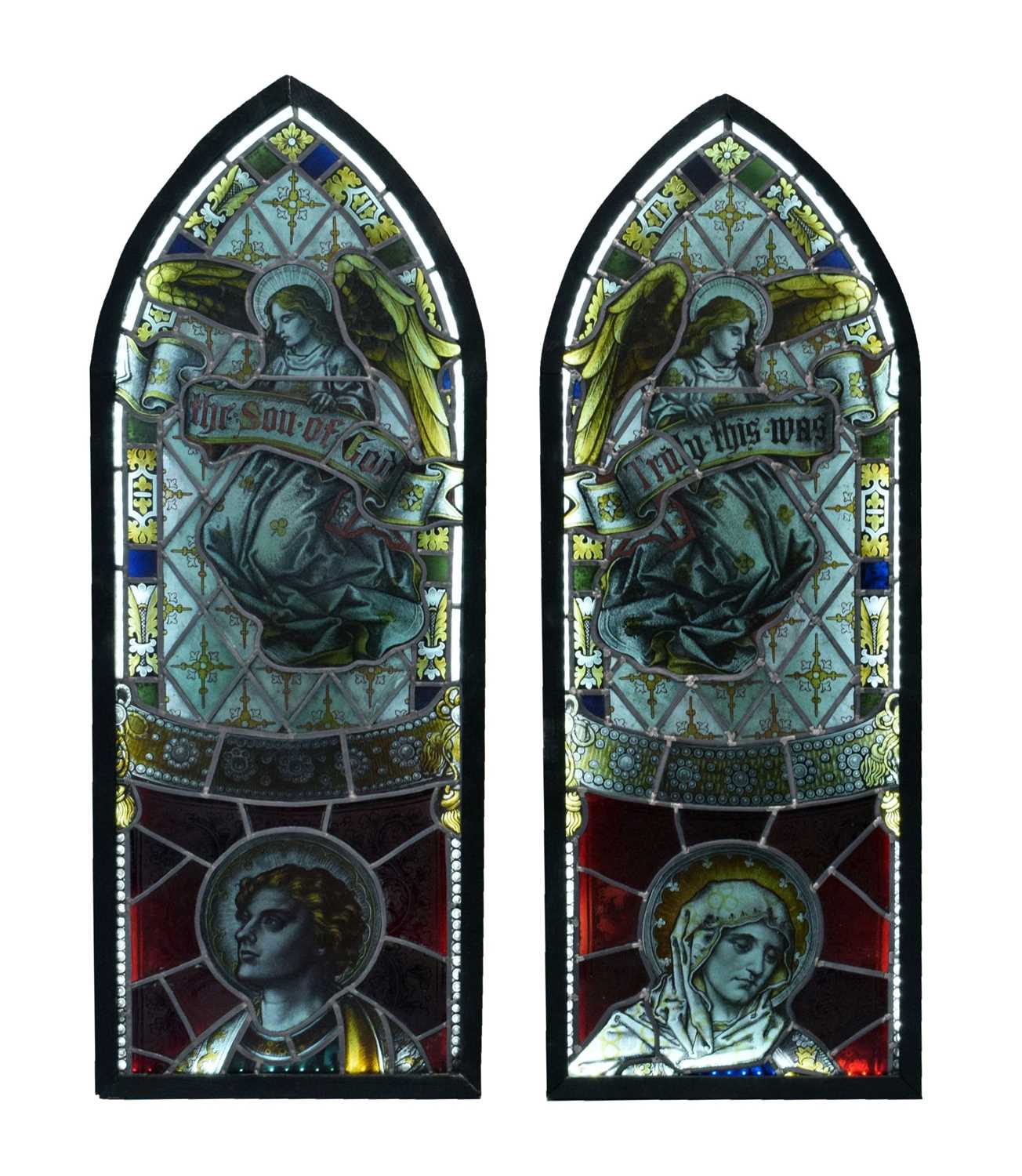 Lot 685 - Pair of lancet arched stained glass panels