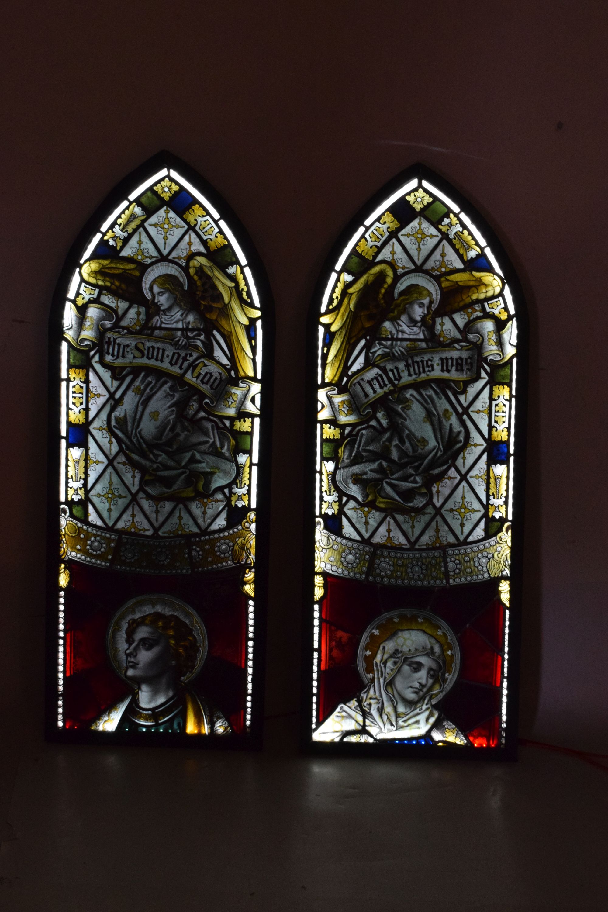 Lot 685 - Pair of lancet arched stained glass panels