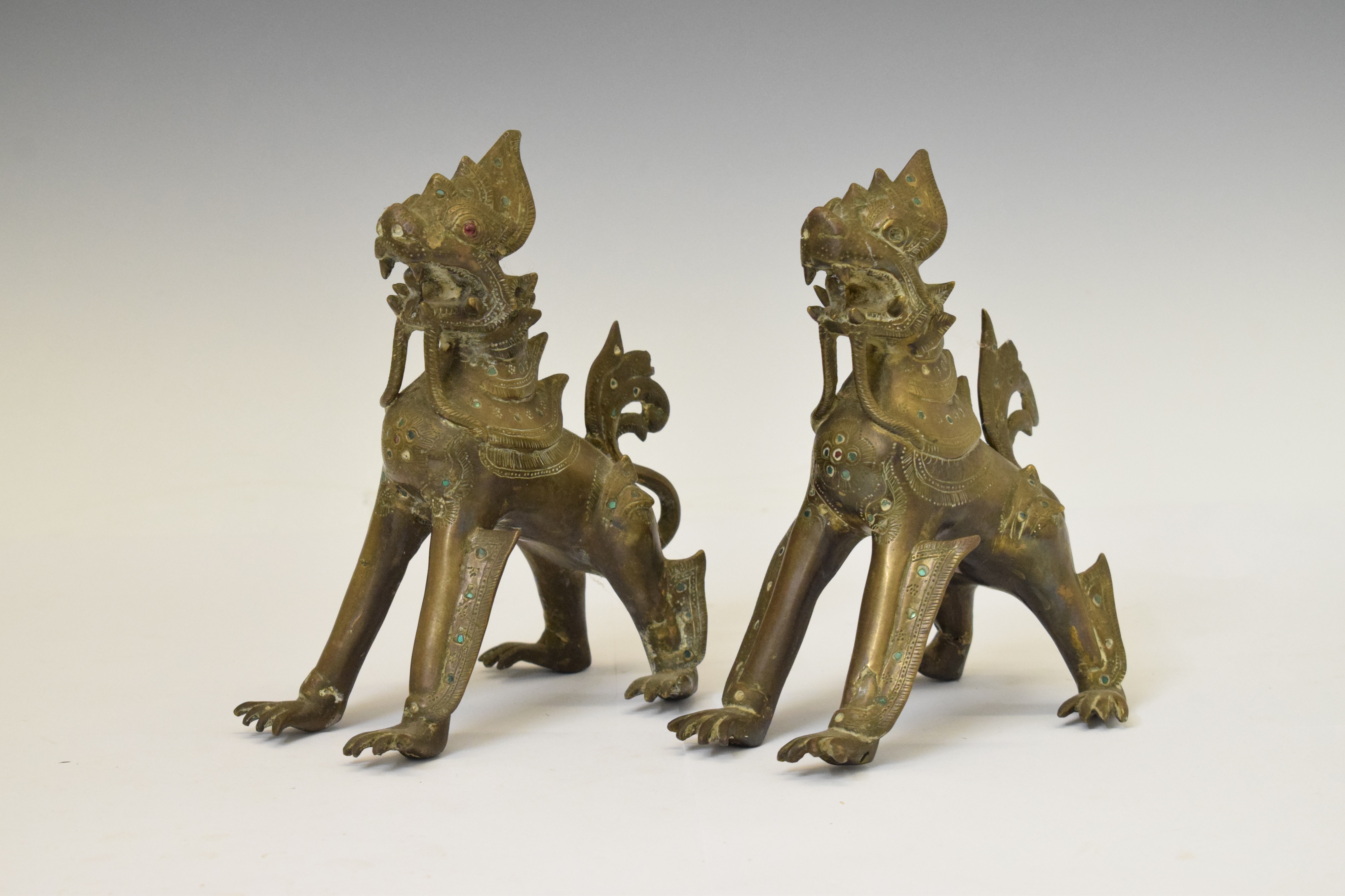 Lot 454 - Pair of antique Burmese bronze 'Chinthe' or