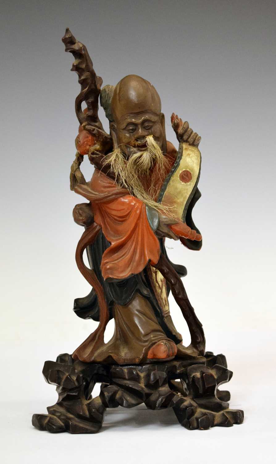 Lot 453 - Chinese carved painted wooden figure of