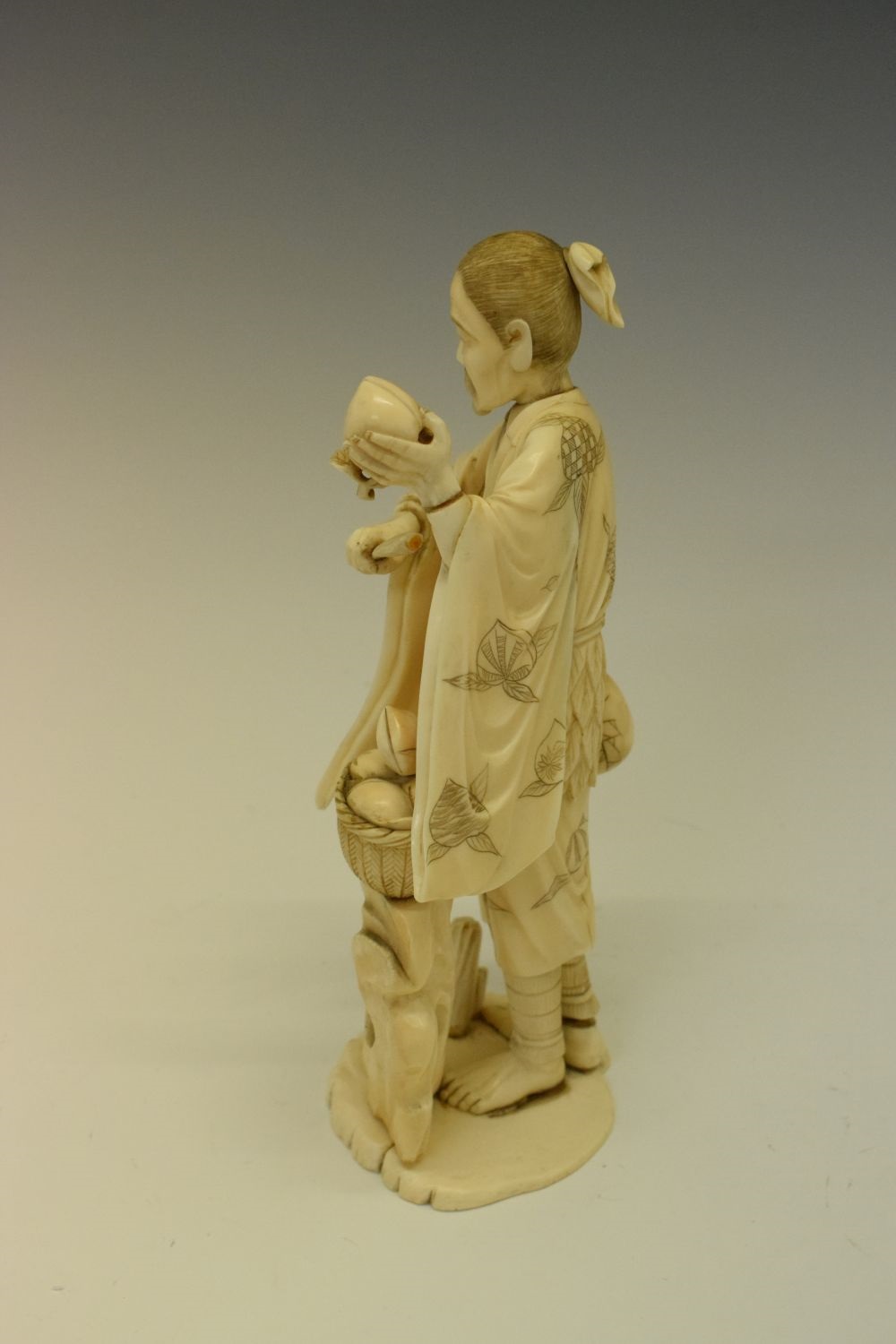 Lot 375 - Japanese Meiji period carved ivory okimono