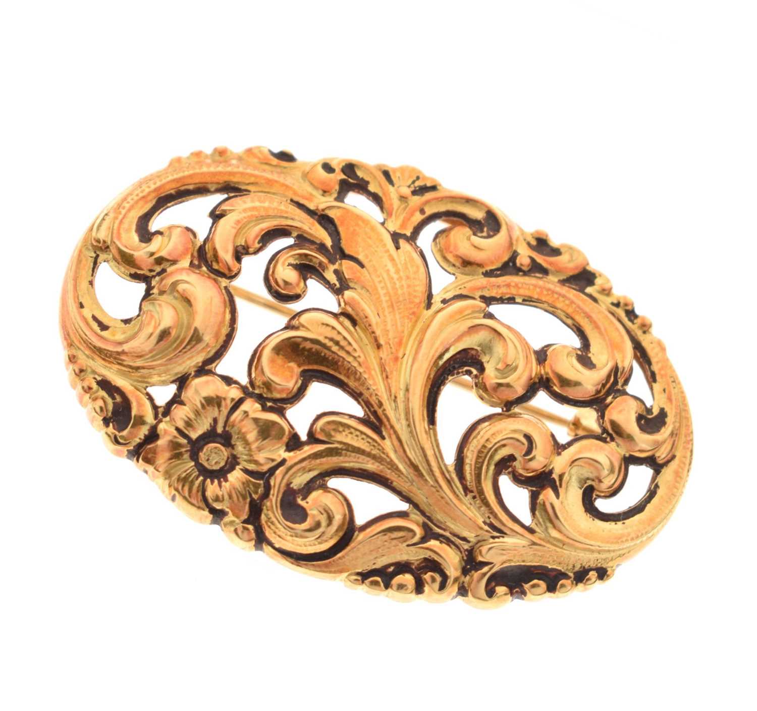 Lot 87 - Yellow metal foliate scroll brooch