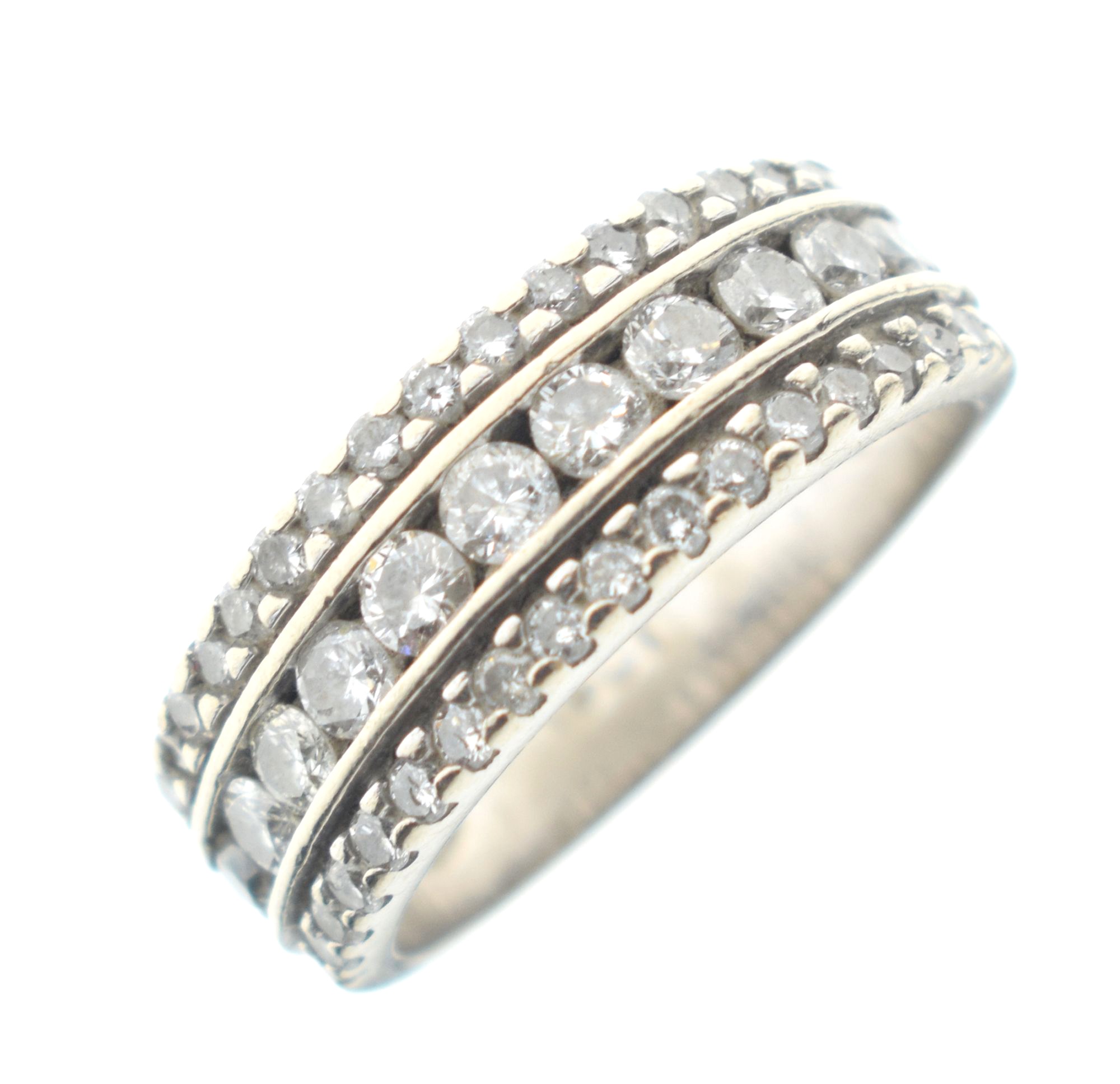 Lot 12 - Diamond three-row dress ring