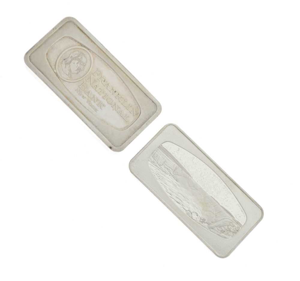 Lot 150 - Two cast silver ingots