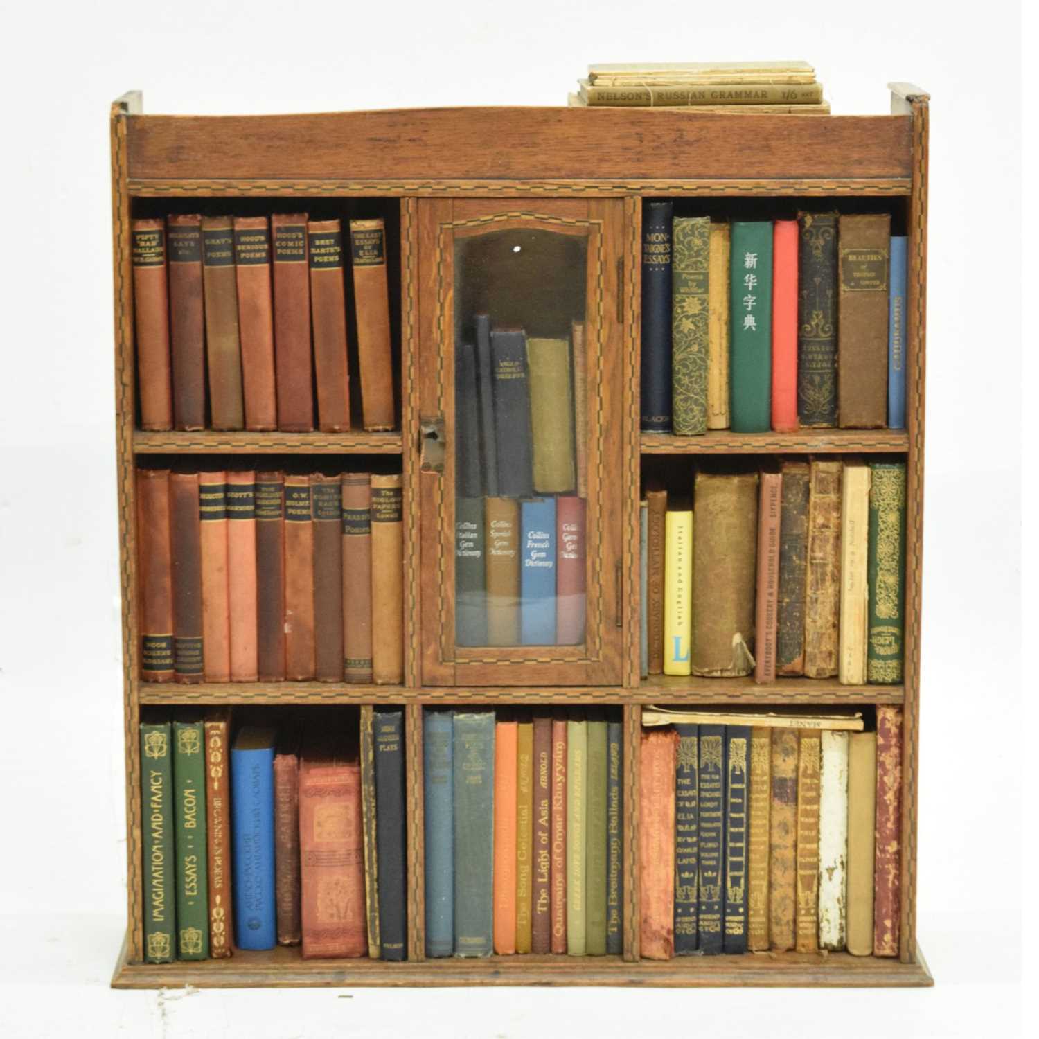 Lot 610 - Early 20th century oak table-top bookcase