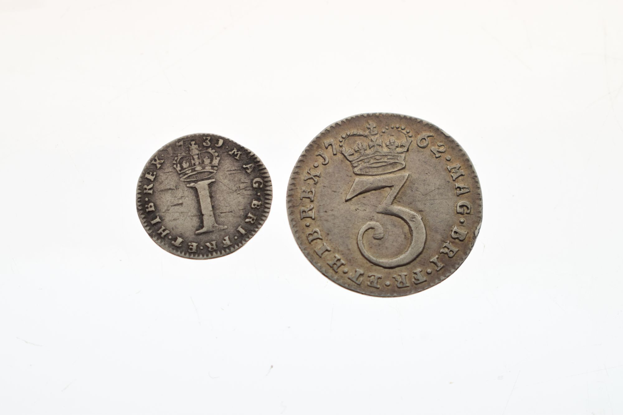 Lot 231 - Four Georgian milled coins, George II and
