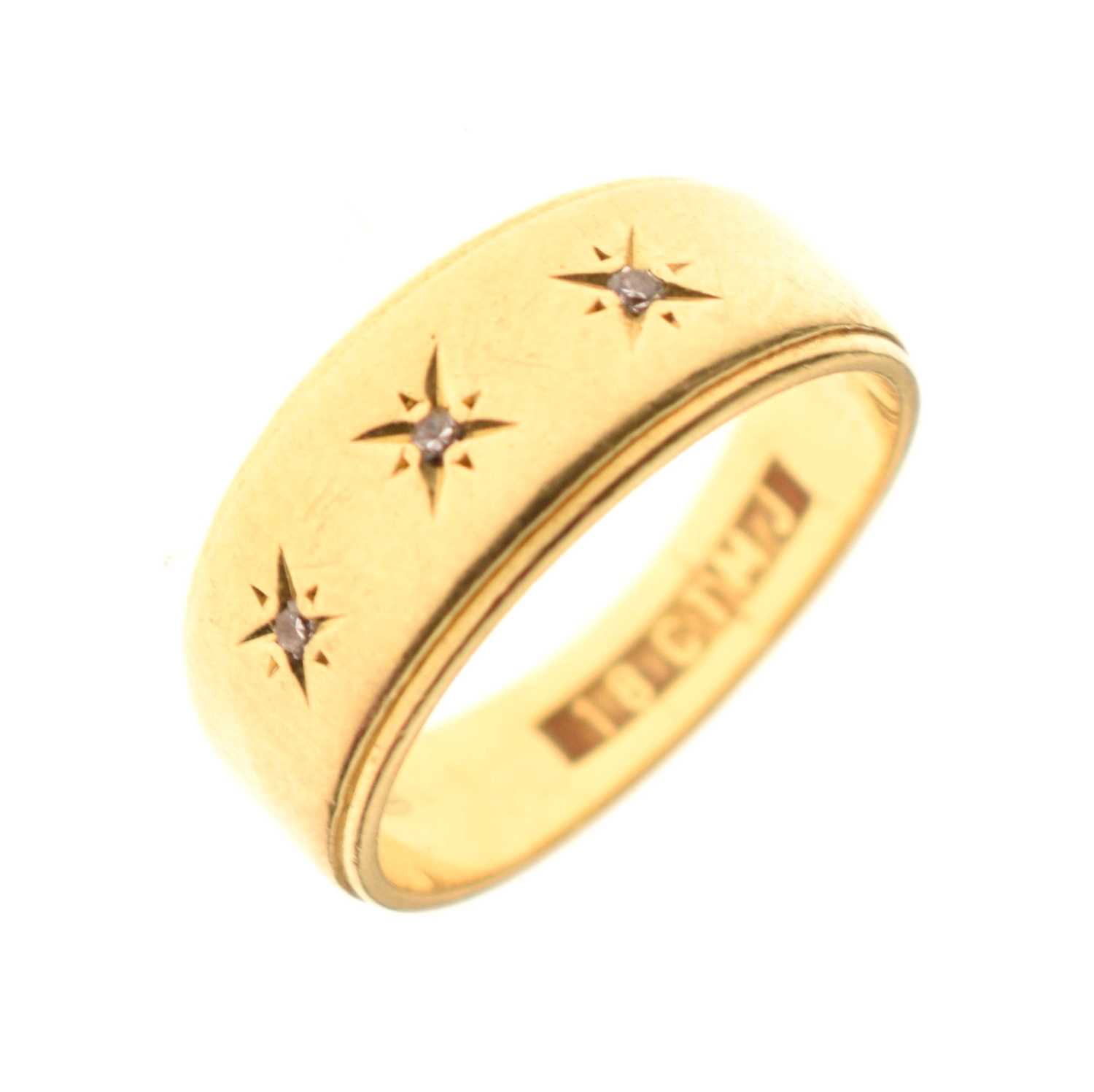 Lot 20 - Diamond three-stone gypsy set ring