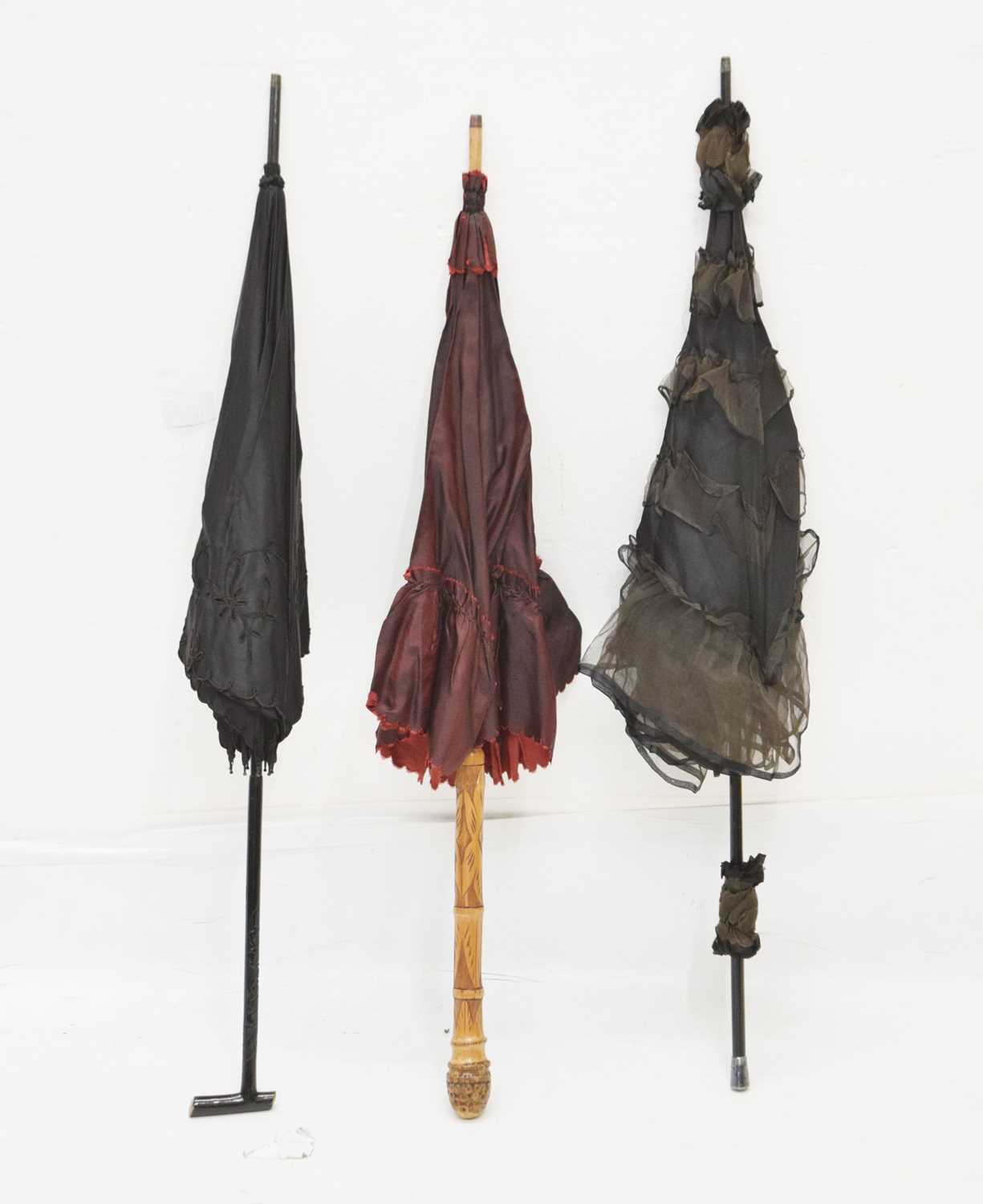 Lot 414 - Paragon black silk parasol and two other