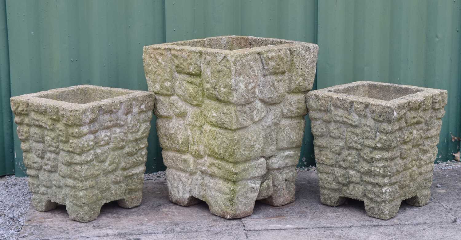 Lot 764 - Three reconstituted stone garden planters