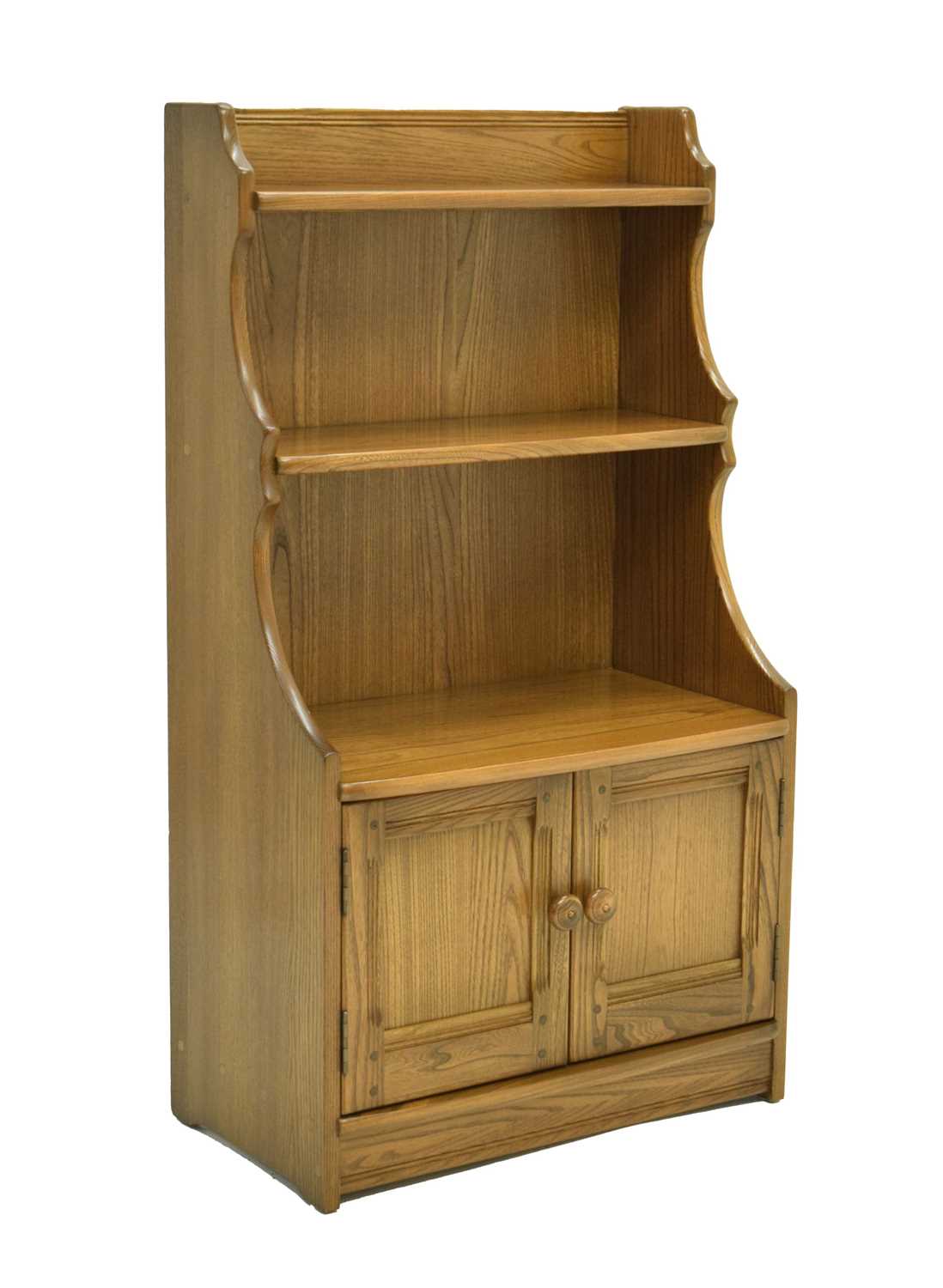 Lot 681 - Ercol Windsor elm waterfall cupboard and