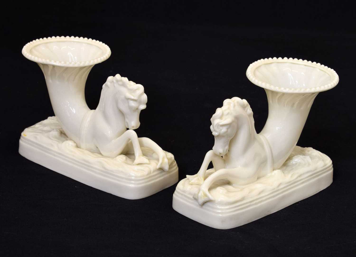Lot 270 - Pair of Belleek figural vases, each modelled