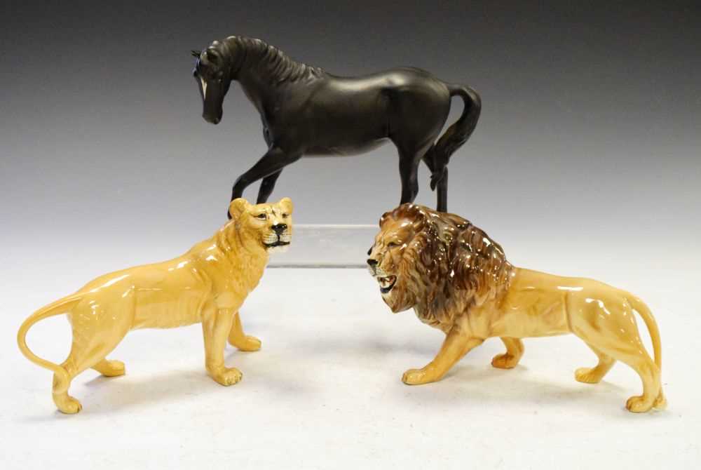 Lot 432 - Beswick lion, lioness, and black horse