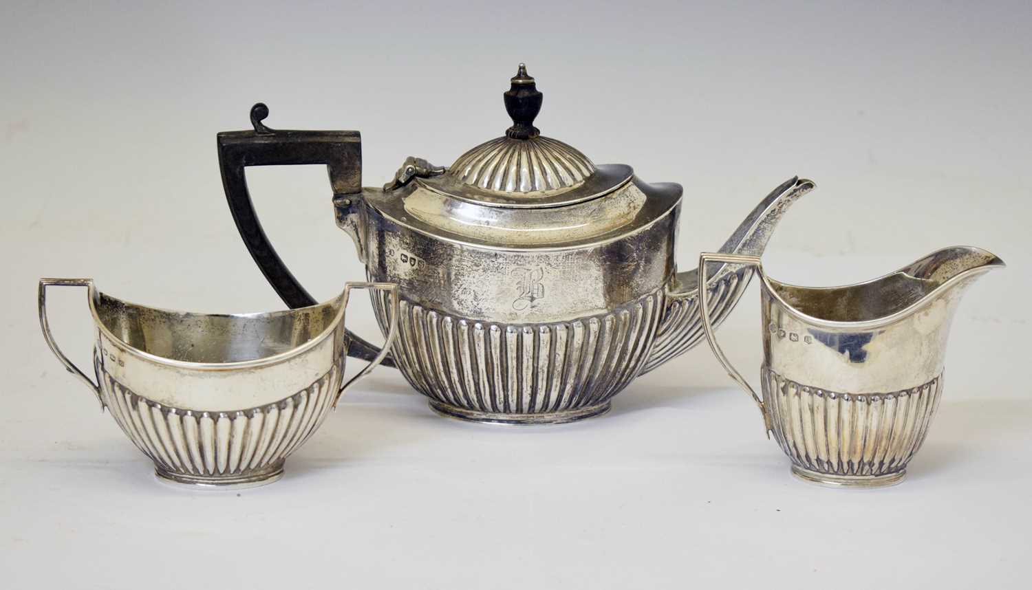 Lot 231 - Matched three-piece silver bachelor's tea