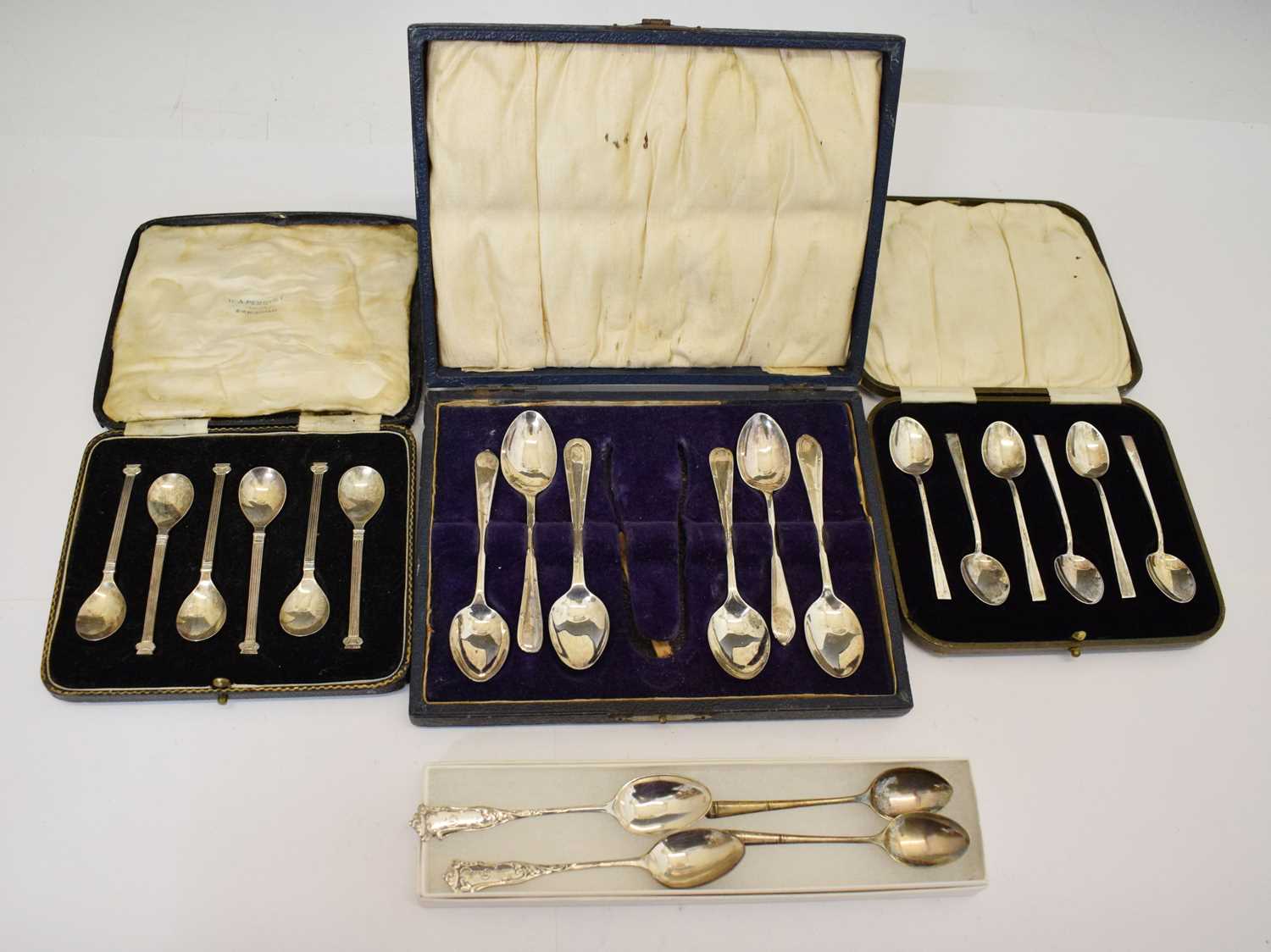 Lot 211 - Two cased sets of silver coffee spoons, etc