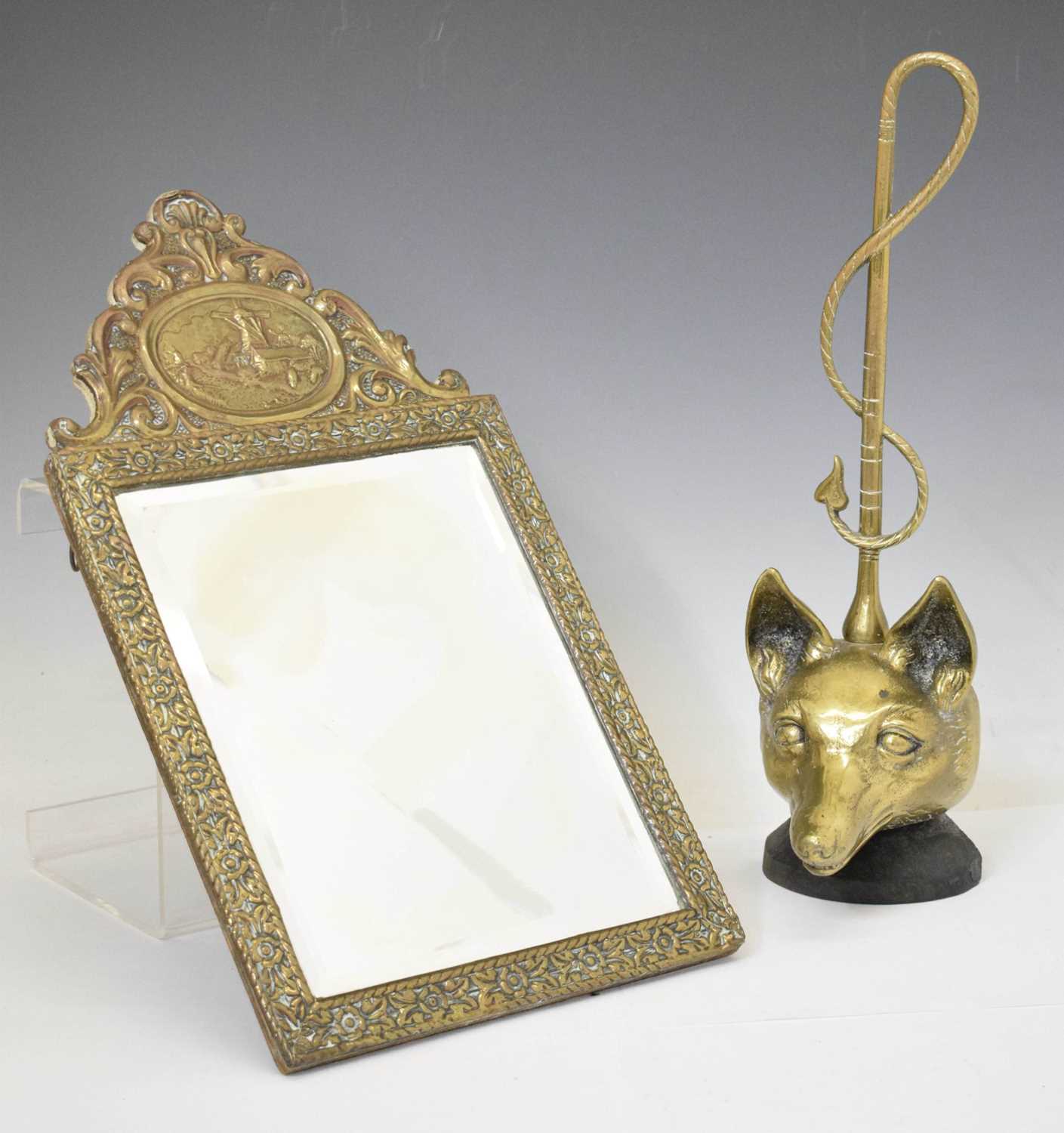 Lot 498 - Early 20th century brass fox head door stop,