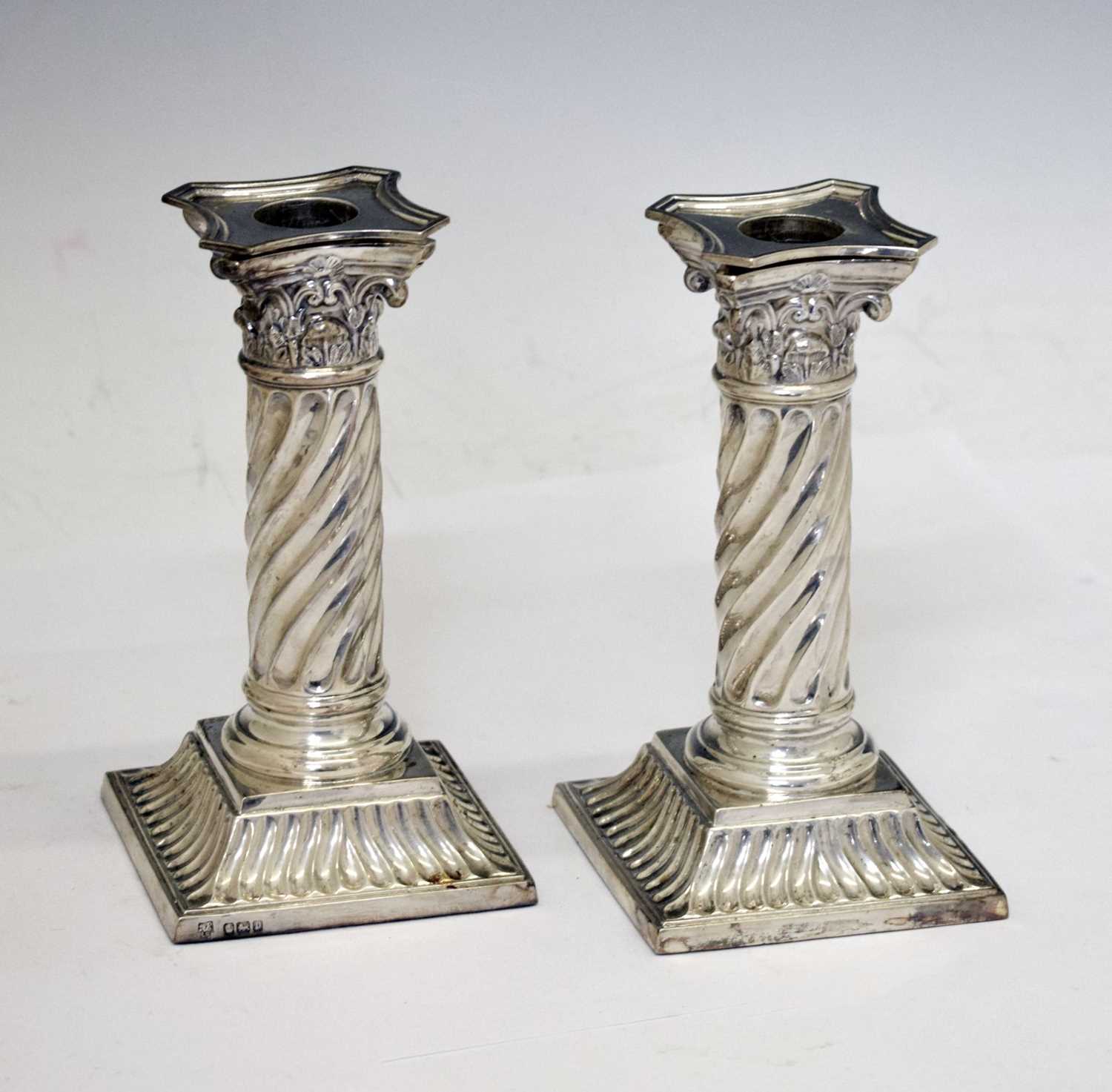Lot 158 - Matched pair of low candlesticks of fluted