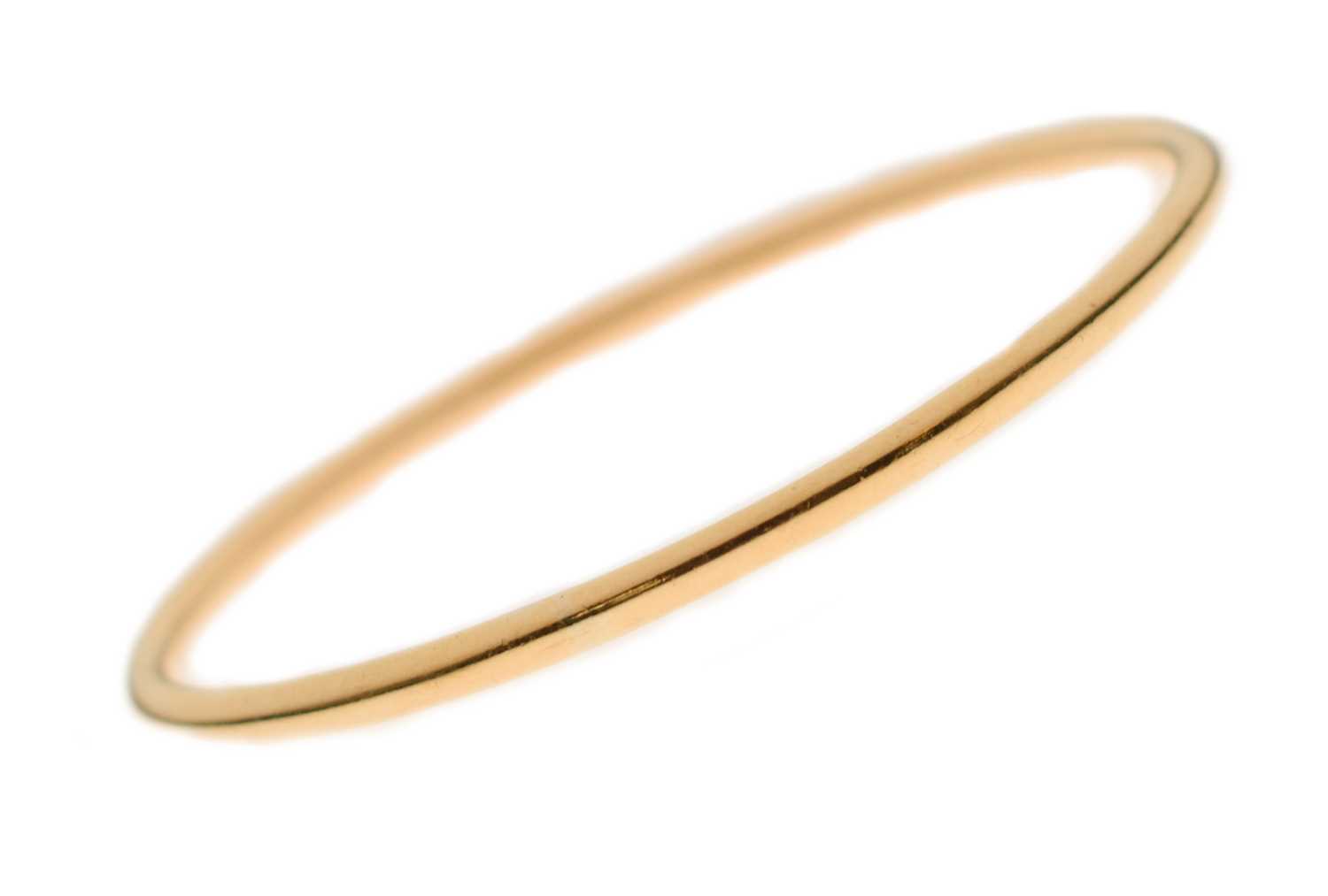 Lot 57 - Eastern high carat yellow metal bangle