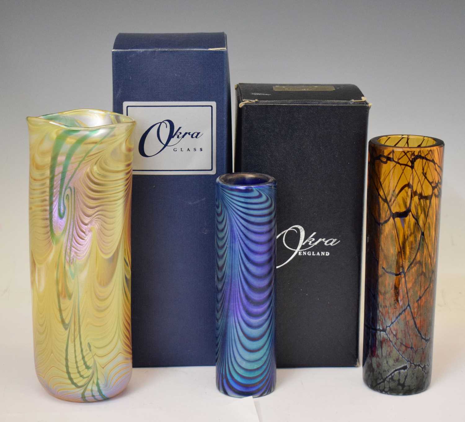 Lot 585 - Three Okra glass cylindrical vases