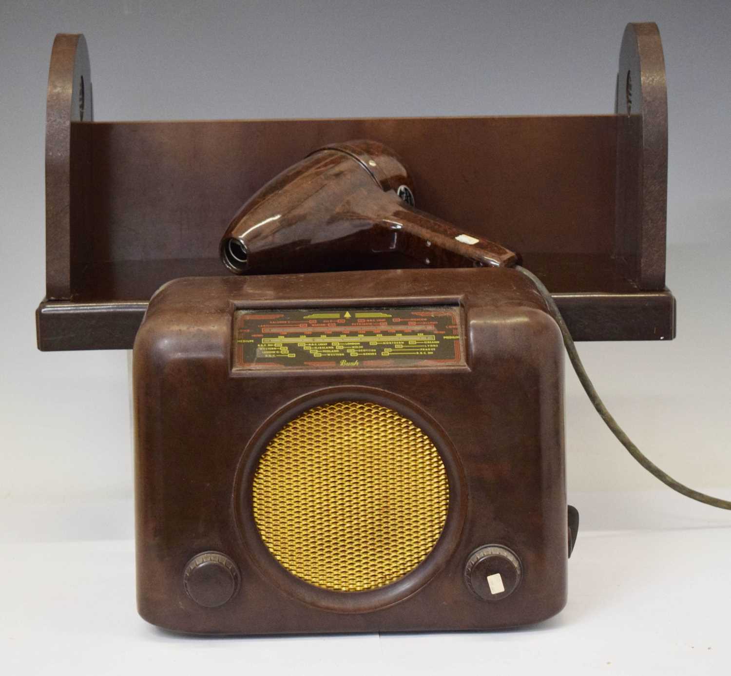 Lot 409 - Brown bakelite 'EBCO' bookcase, radio, and