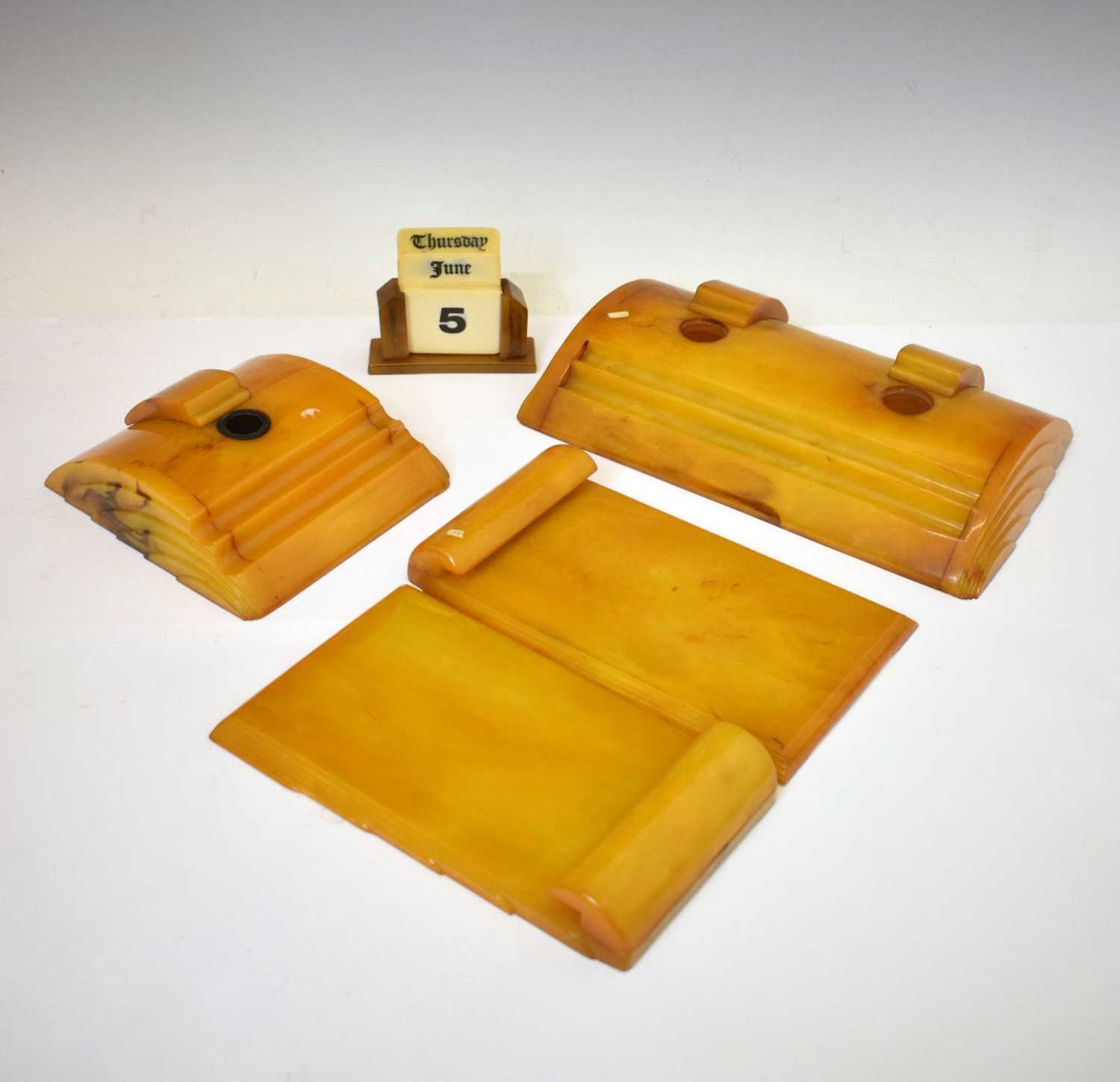 Lot 358 - Art Deco amber bakelite desk accessories
