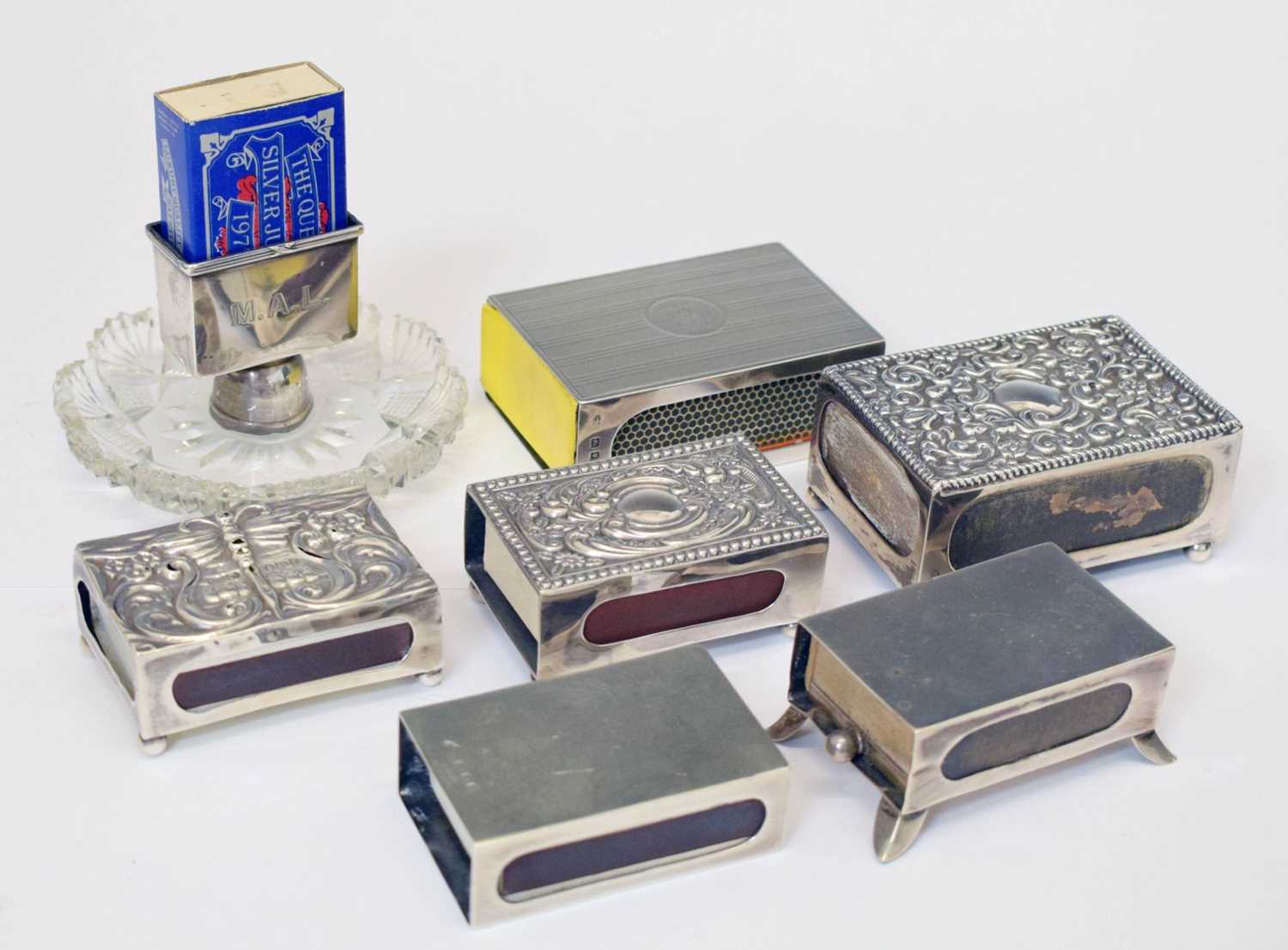 Lot 293 - Six matchbox holders together with a silver