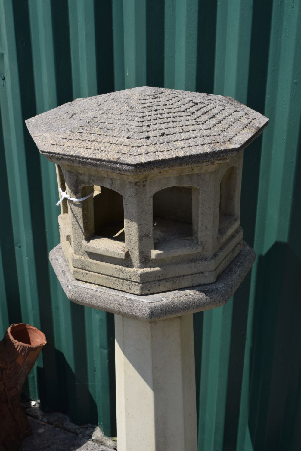 Lot 780 - Modern octagonal composite 'stone' bird