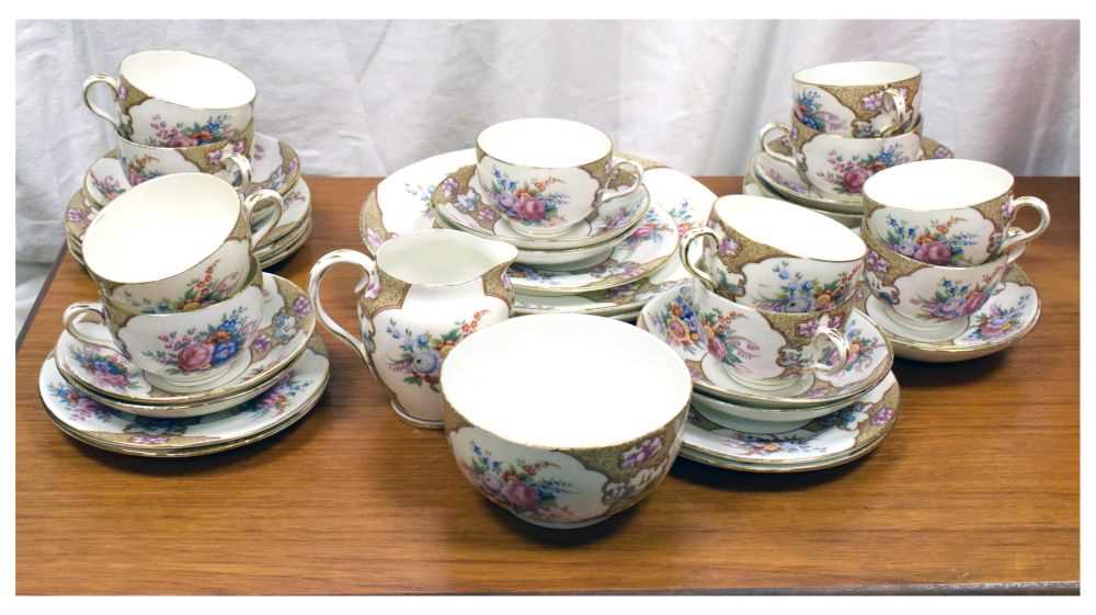 Lot 556 - Crown Staffordshire floral tea set