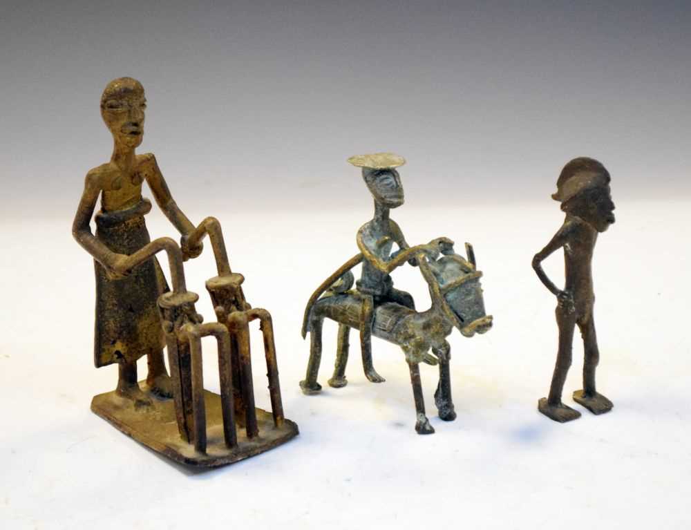 Lot 283 - Four African cast figures